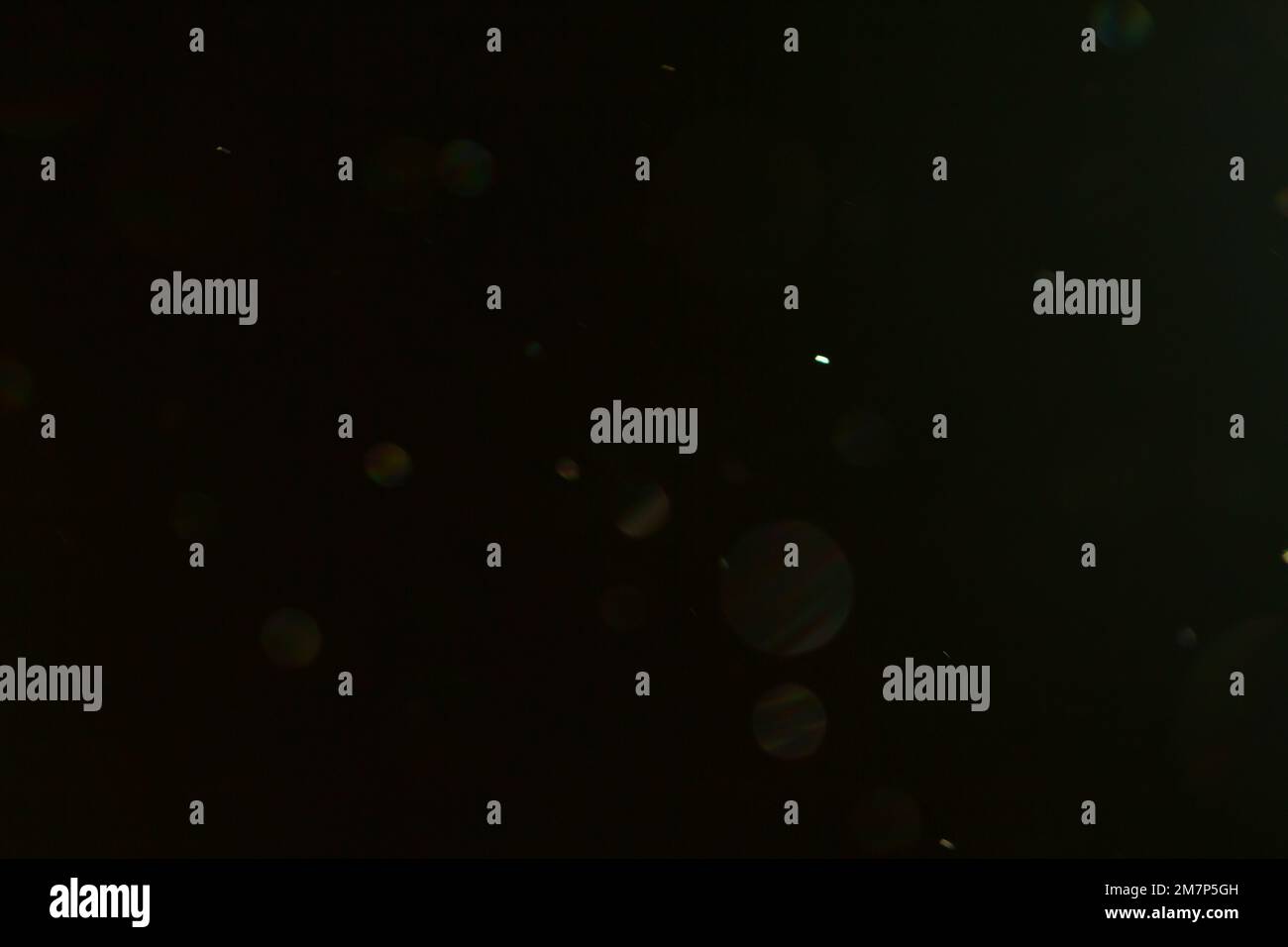 Dust particles overlay texture on black background Stock Photo - Alamy