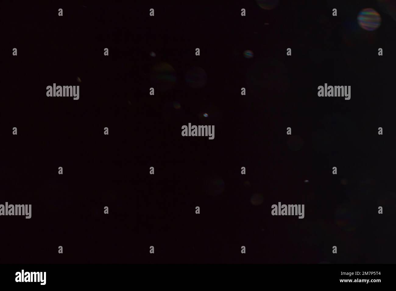 Dust particles overlay texture on black background Stock Photo - Alamy