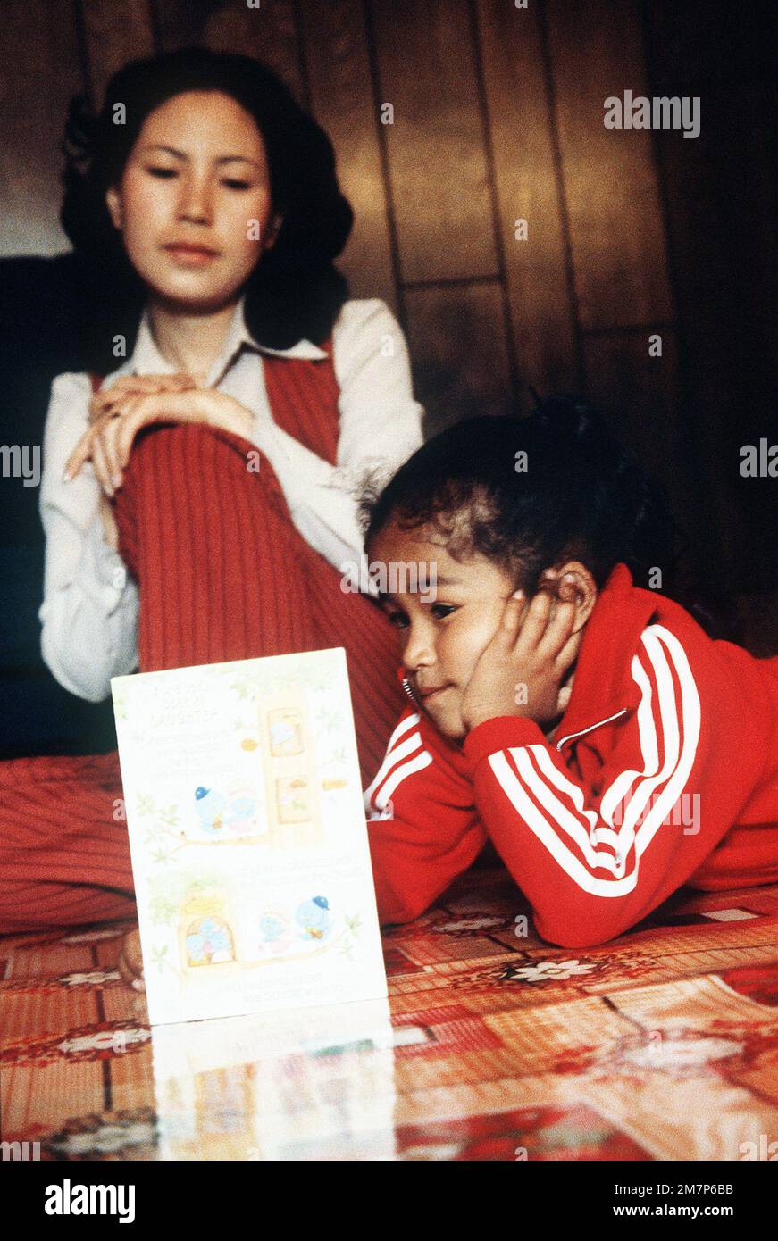 Ms. Tae Sun Pak (left), a social worker employed by the Osan Air Base Chapter of the Amerasian ...