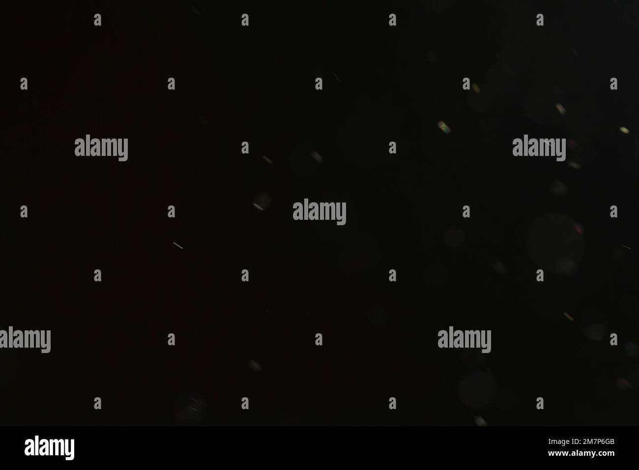Dust particles overlay texture on black background Stock Photo - Alamy