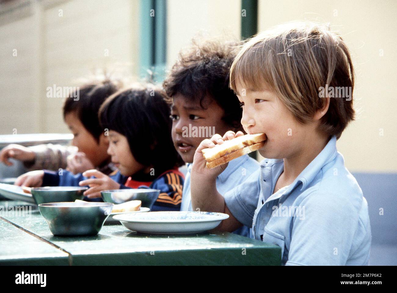 Amerasian children are served lunch at the St. Vincent's Home for ...