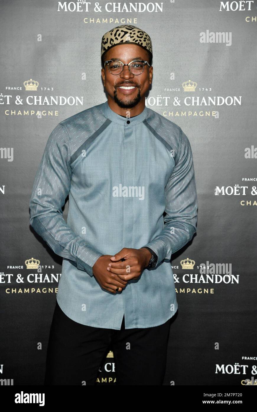 Maps Maponyane attends the Moet & Chandon holiday season celebration at ...