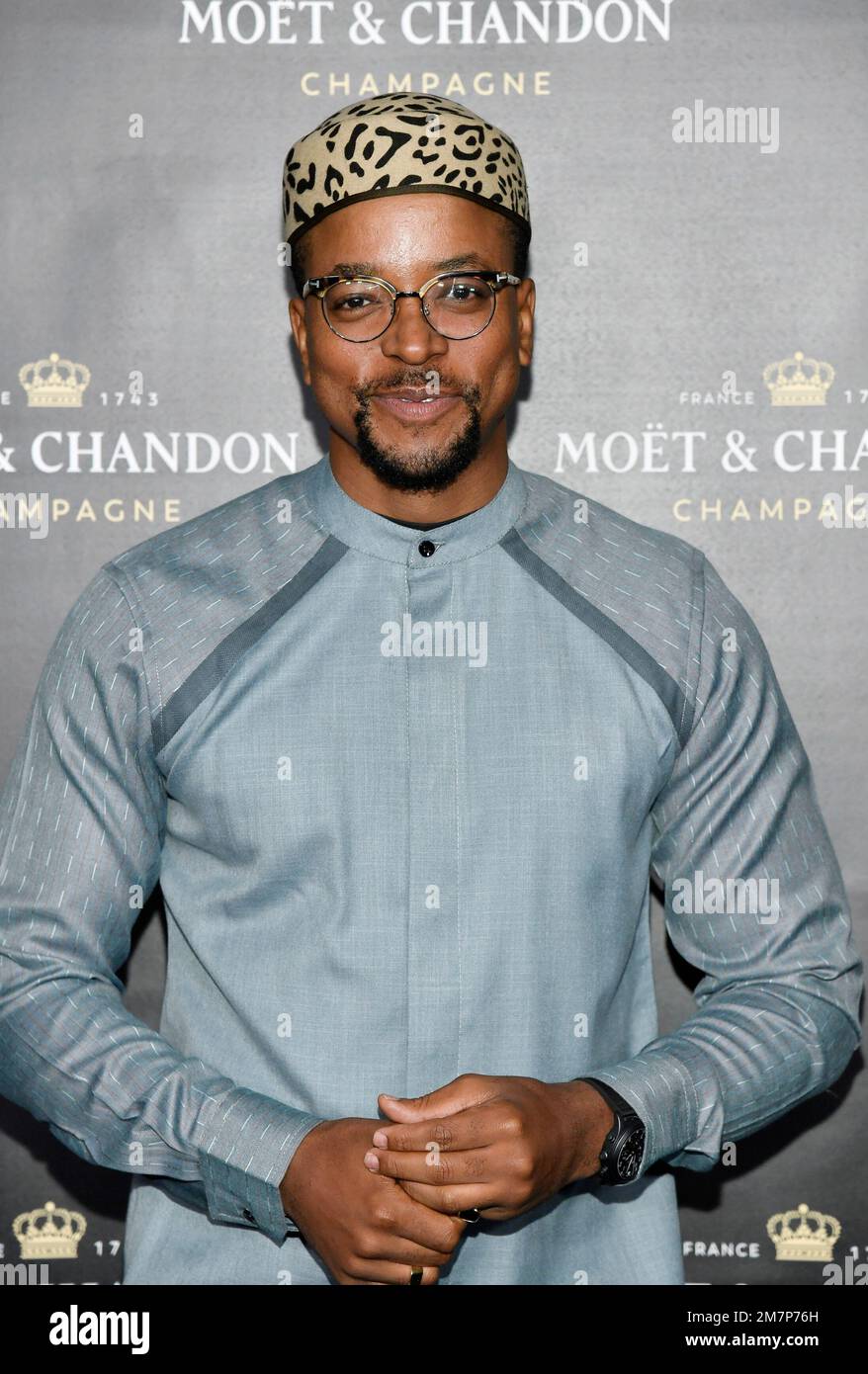 Maps Maponyane attends the Moet & Chandon holiday season celebration at ...