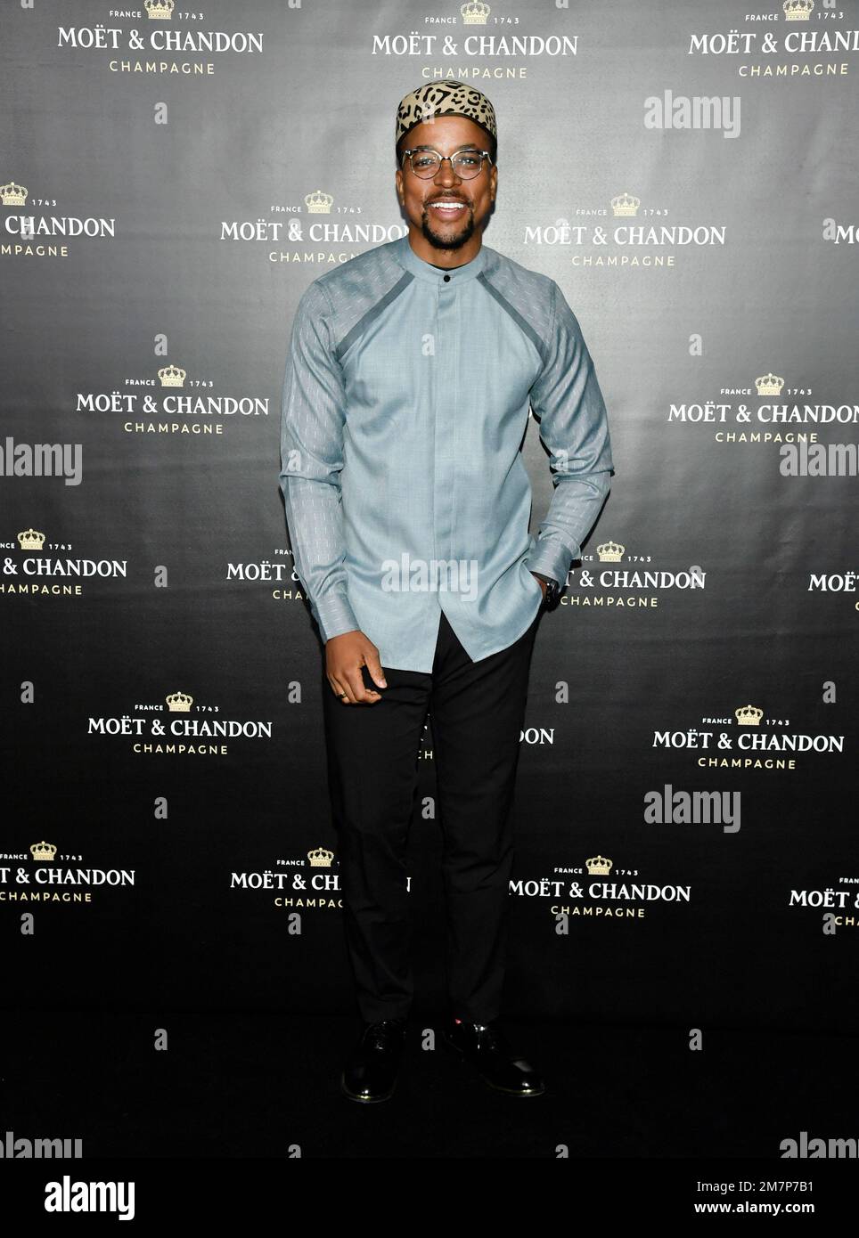 Maps Maponyane attends the Moet & Chandon holiday season celebration at ...