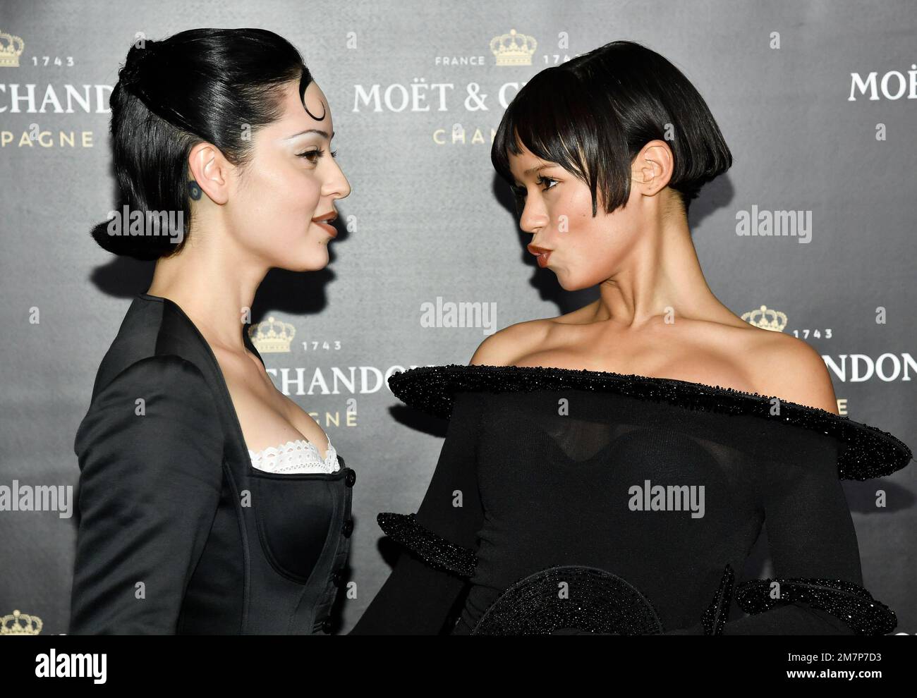 Alexa Demie, left, and Taylor Russell attend the Moet & Chandon holiday ...