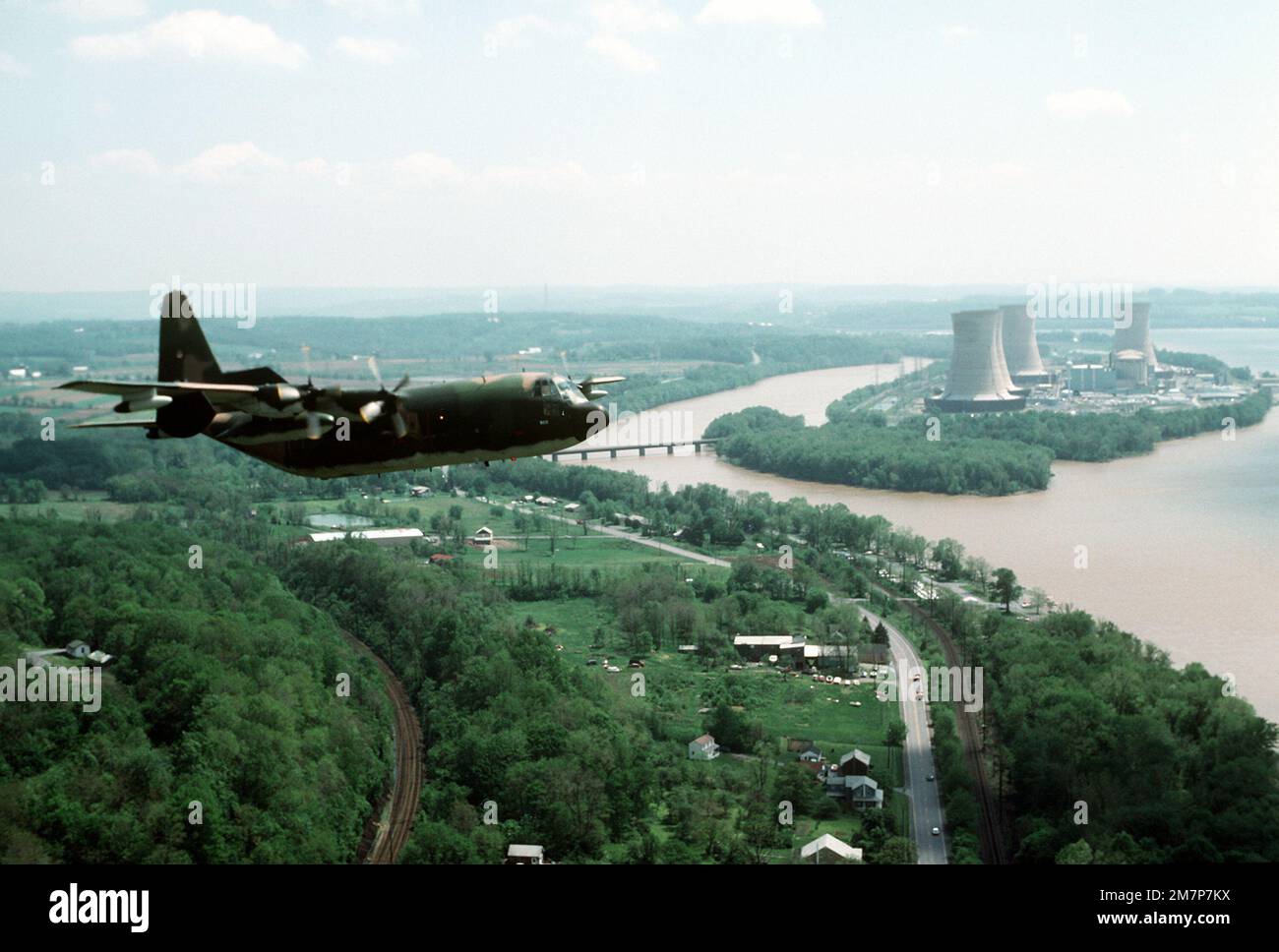 AN air-to-air right front view of an EC-130 Hercules aircraft. The ...