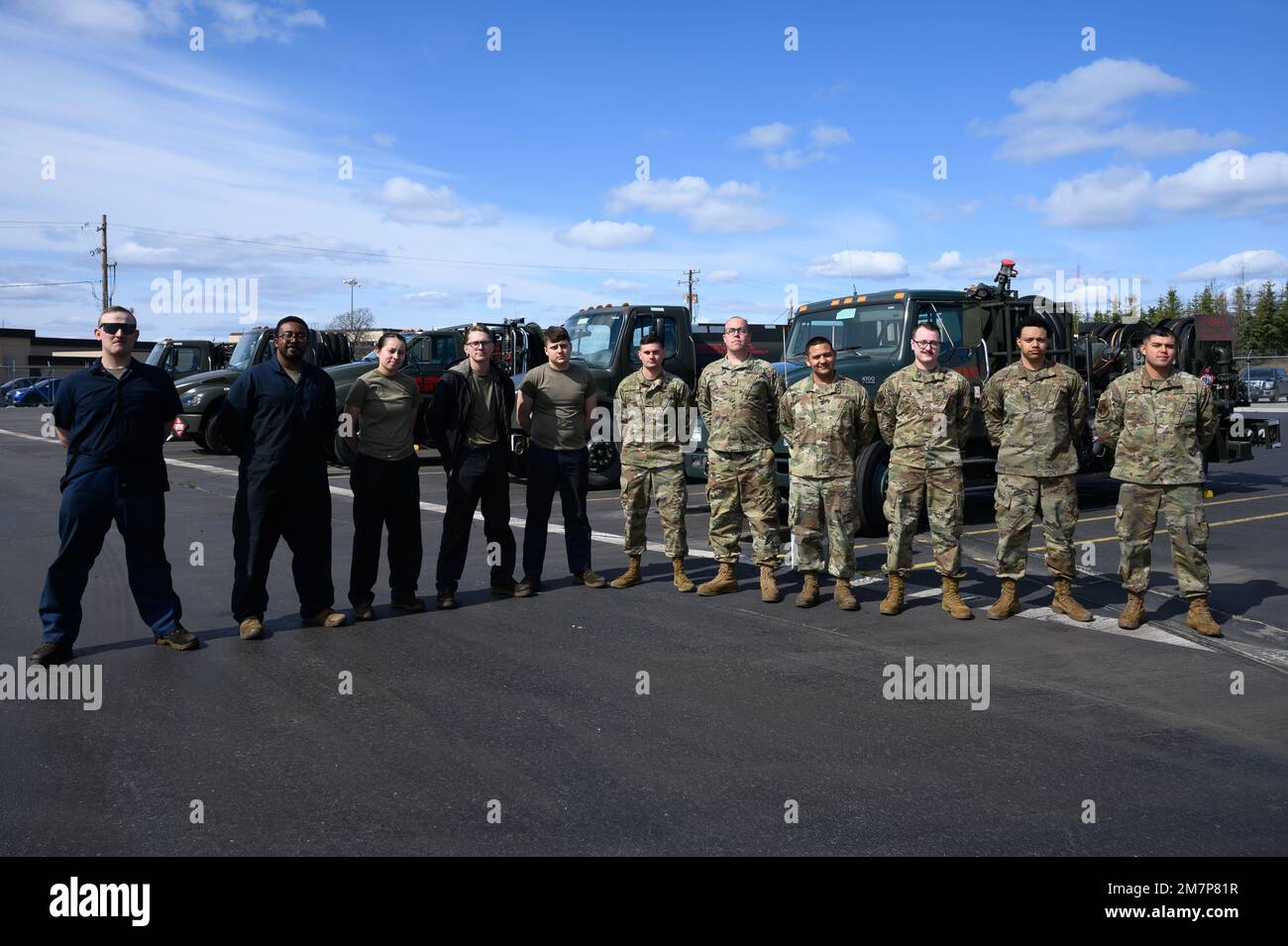 U.S. Airmen assigned to the 354th Logistics Readiness Squadron pose for ...