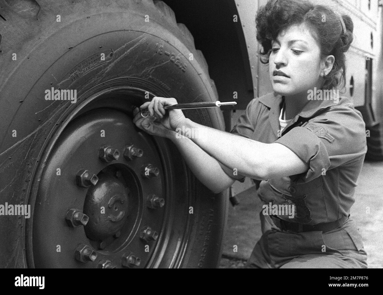 AMN Monica Gonzalez, a member of the fire department, checks the ...