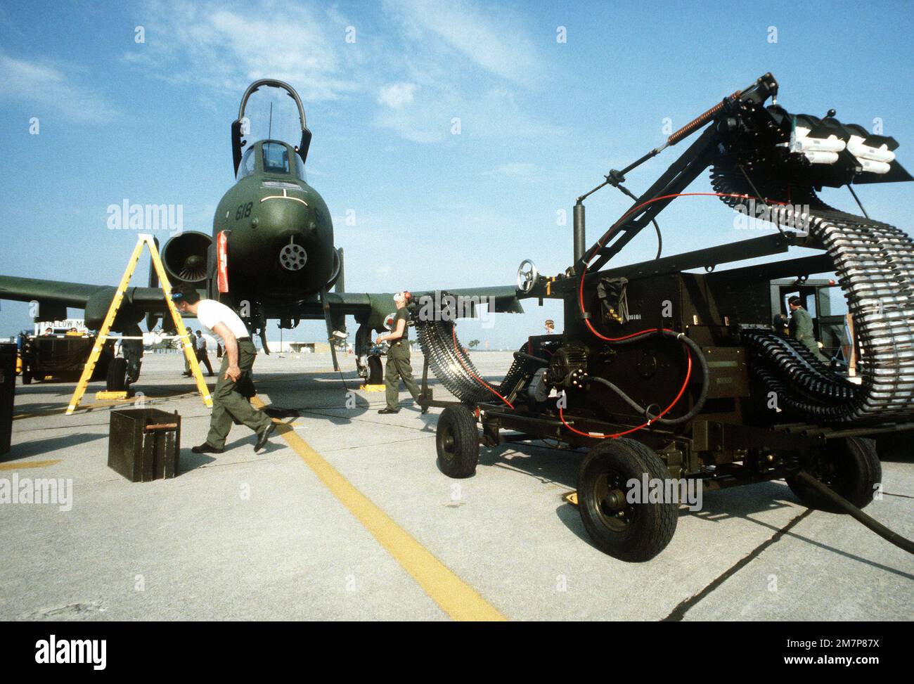 AN automatic loader is moved into position for loading the 30mm nose ...