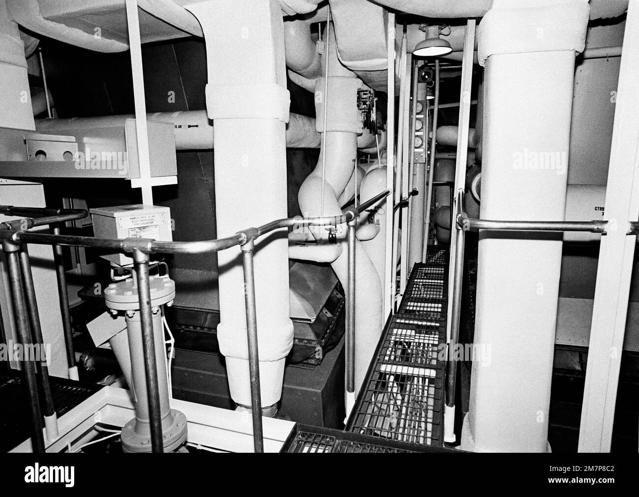 An interior view of the engine room on the guided missile frigate ...