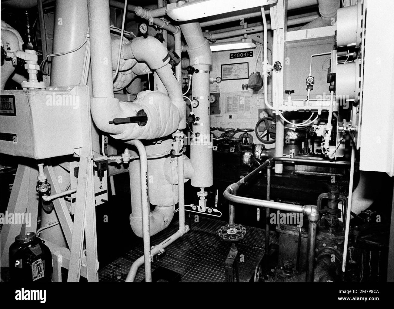 An interior view of auxiliary machine room No. 1 on the guided missile ...