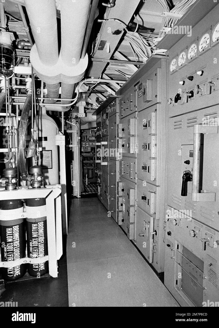 An interior view of auxiliary machine room No. 2 on the guided missile ...