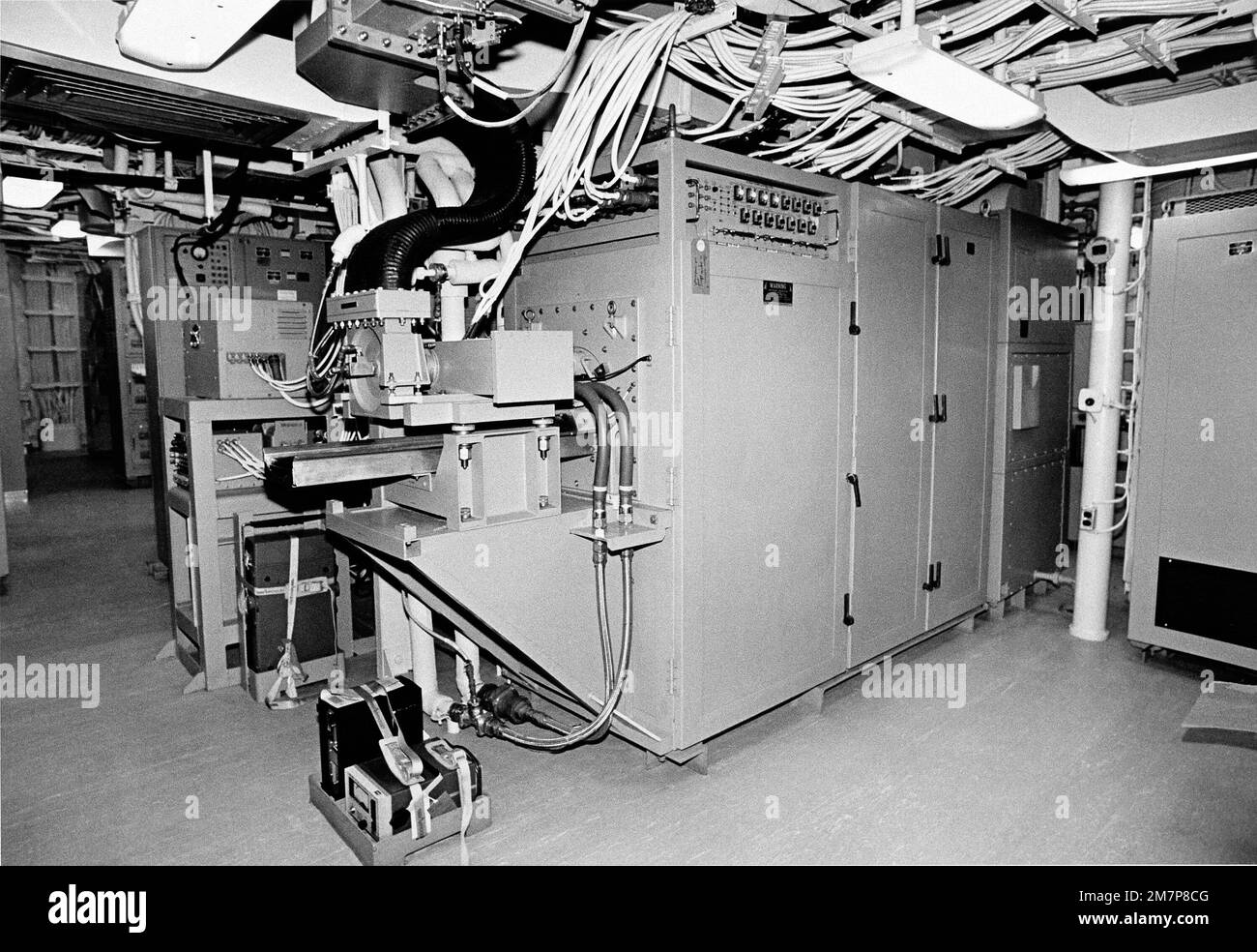 An interior view of the combat information center on the guided missile ...