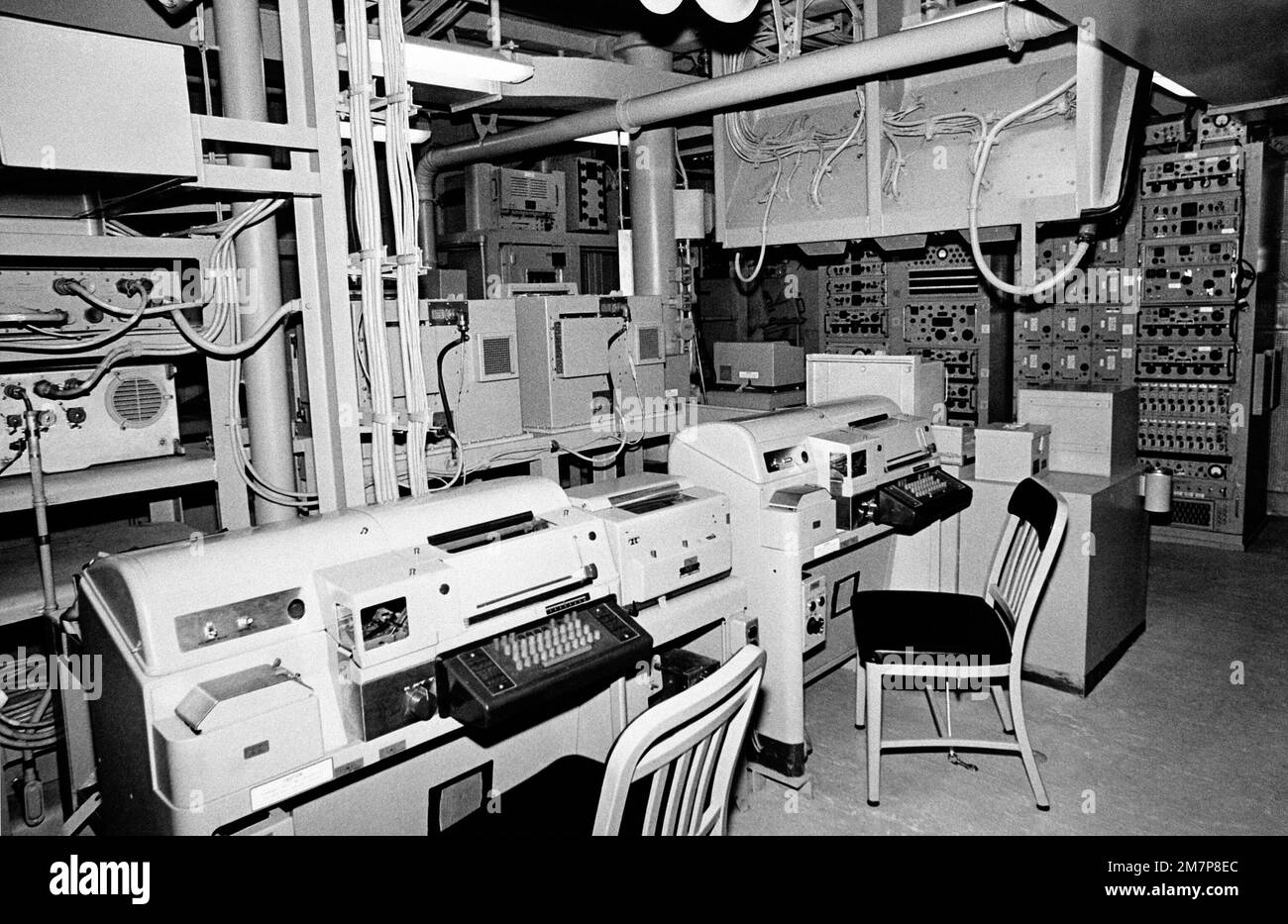An interior view of the communications center on the guided missile ...