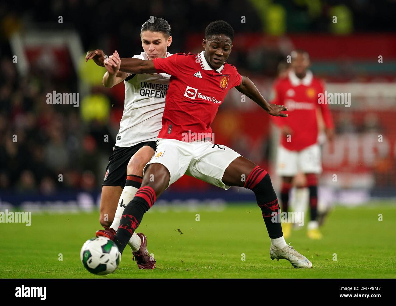 Manchester United's Kobbie Mainoo (right) and Charlton Athletic's ...