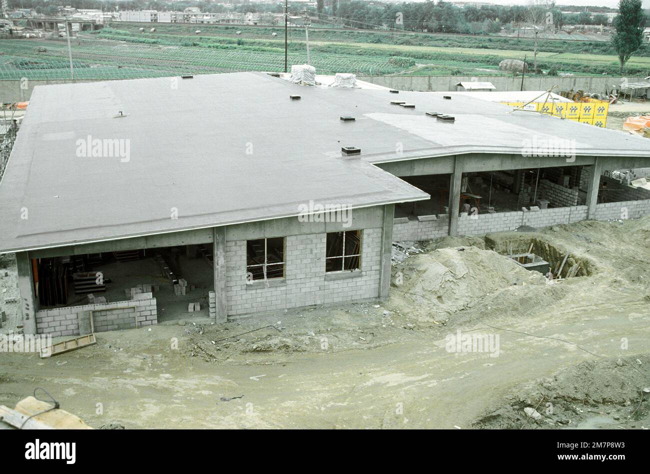Aerial view of the dining hall under construction. Base: Suwon Air Base ...