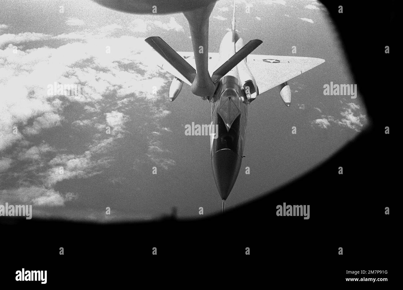 A view through the window of a KC-135 Stratotanker aircraft from the ...