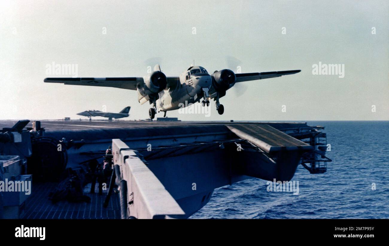 A C-1A Trader aircraft takes off from the flight deck of the aircraft ...