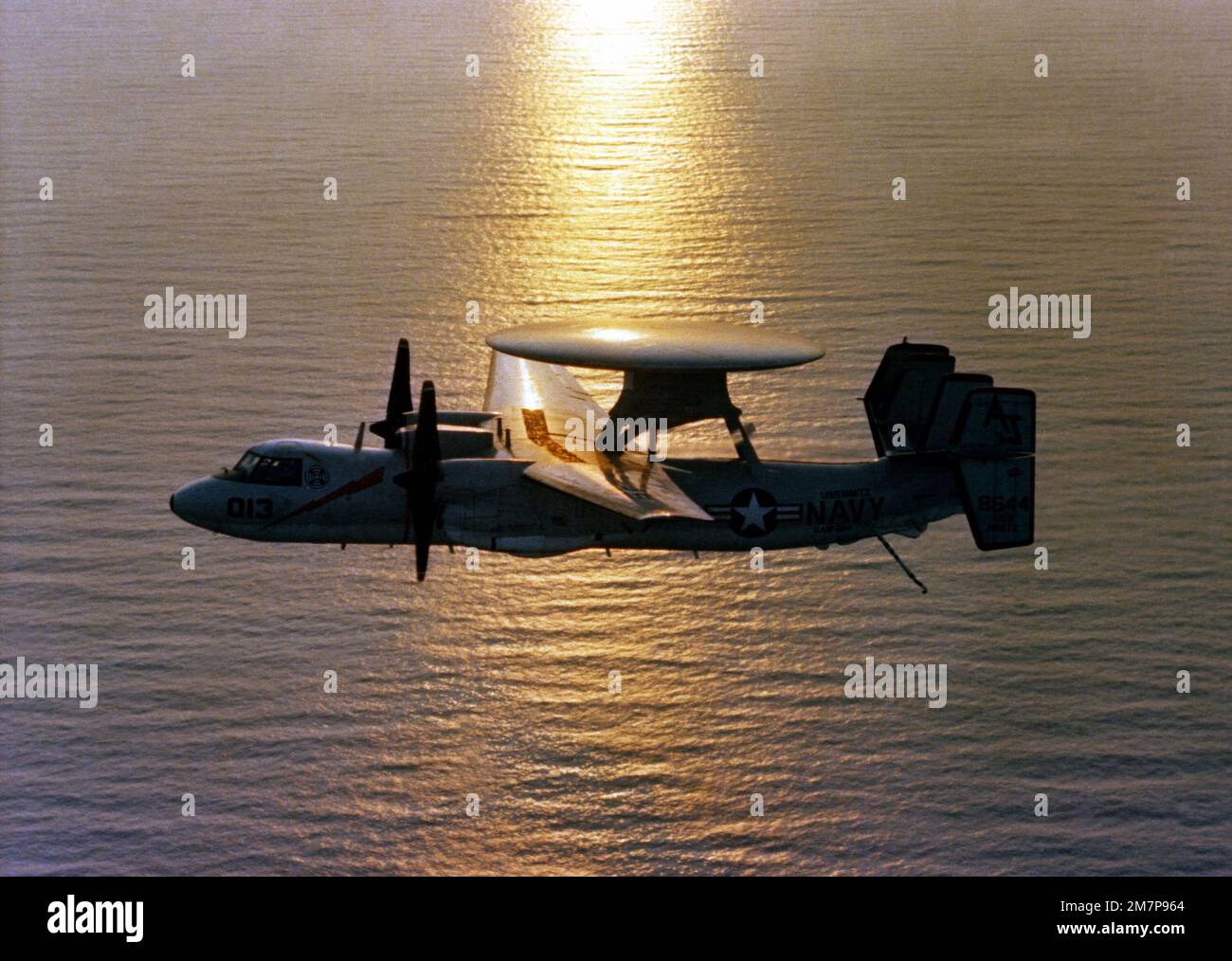 An air-to-air left side view of an E-2C Hawkeye aircraft from Airborne ...