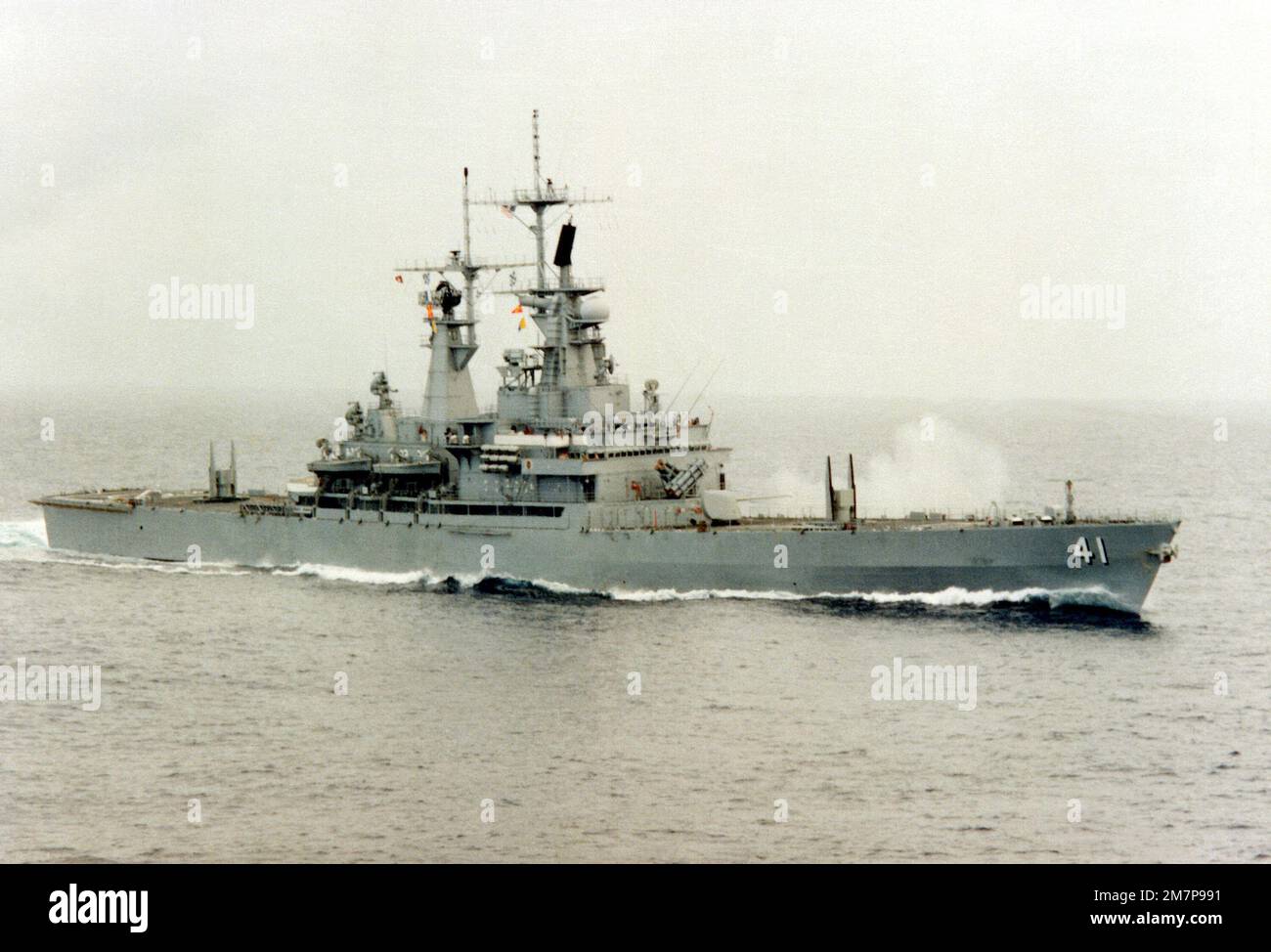 A starboard bow view of the nuclear-powered guided missile cruiser USS ...
