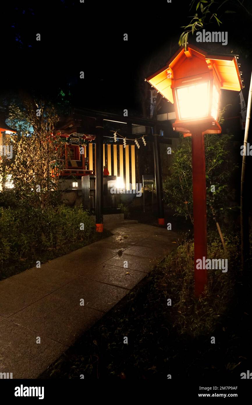 A red latern next to a way to a prayer place in a shrine Stock Photo ...