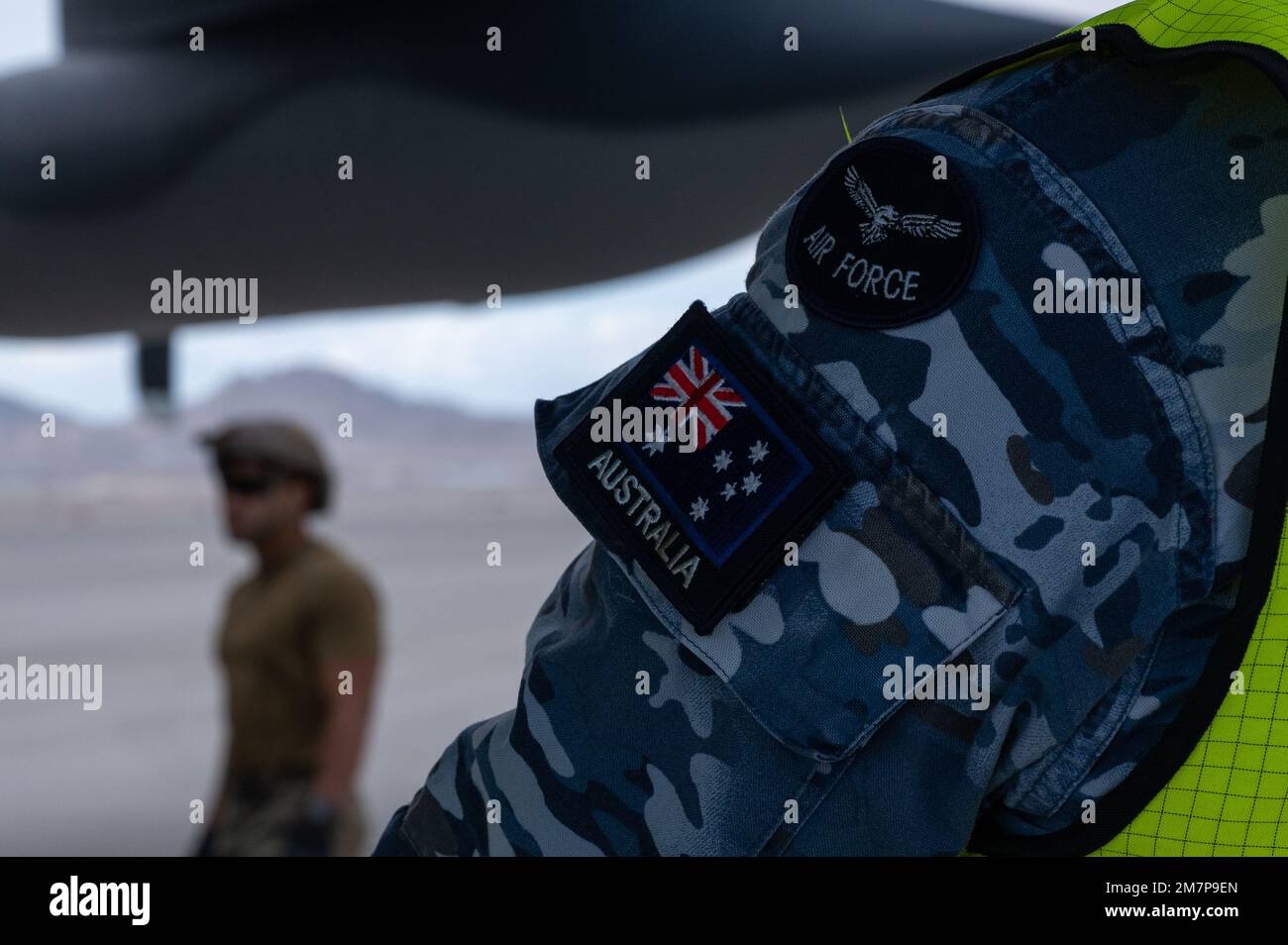 Royal Australian Air Force (RAAF) Airmen observe U.S. Air Force Airmen ...