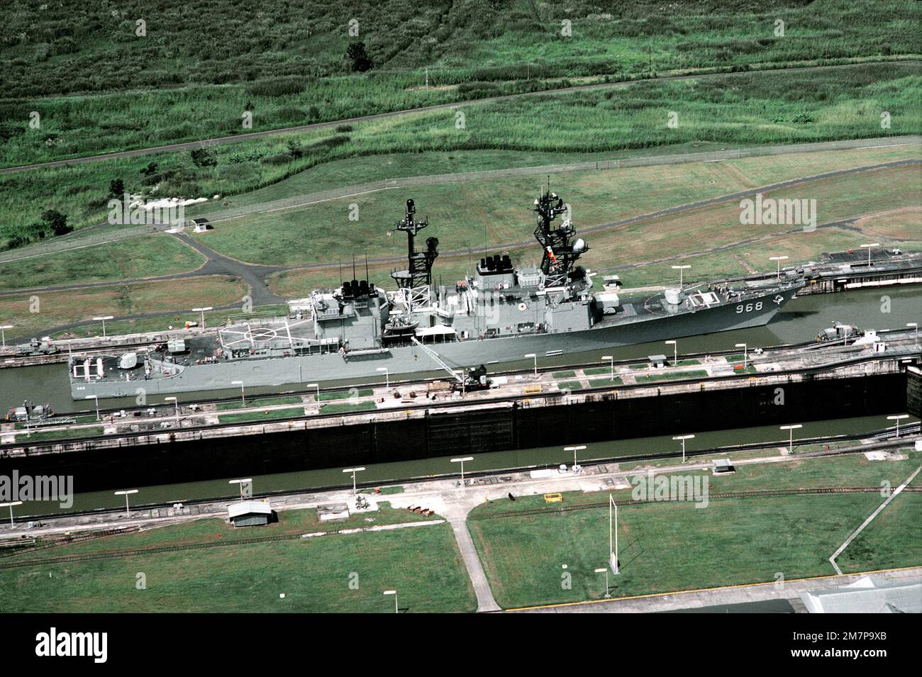 Aerial starboard beam view of the destroyer USS ARTHUR W. RADFORD (DD ...