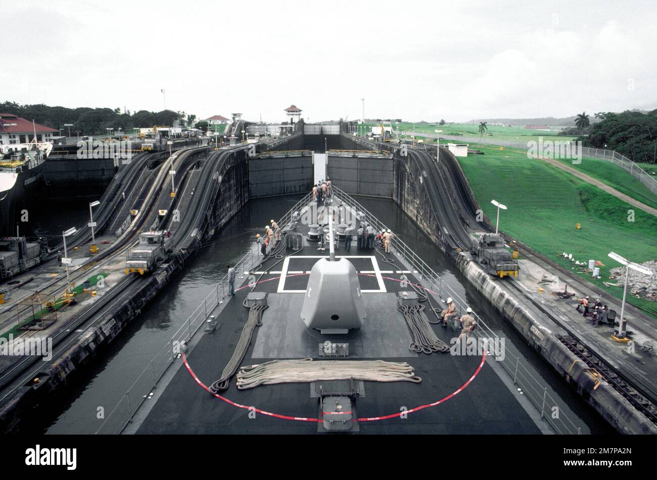 A view of a lock on the Panama Canal, as seen from the superstructure ...