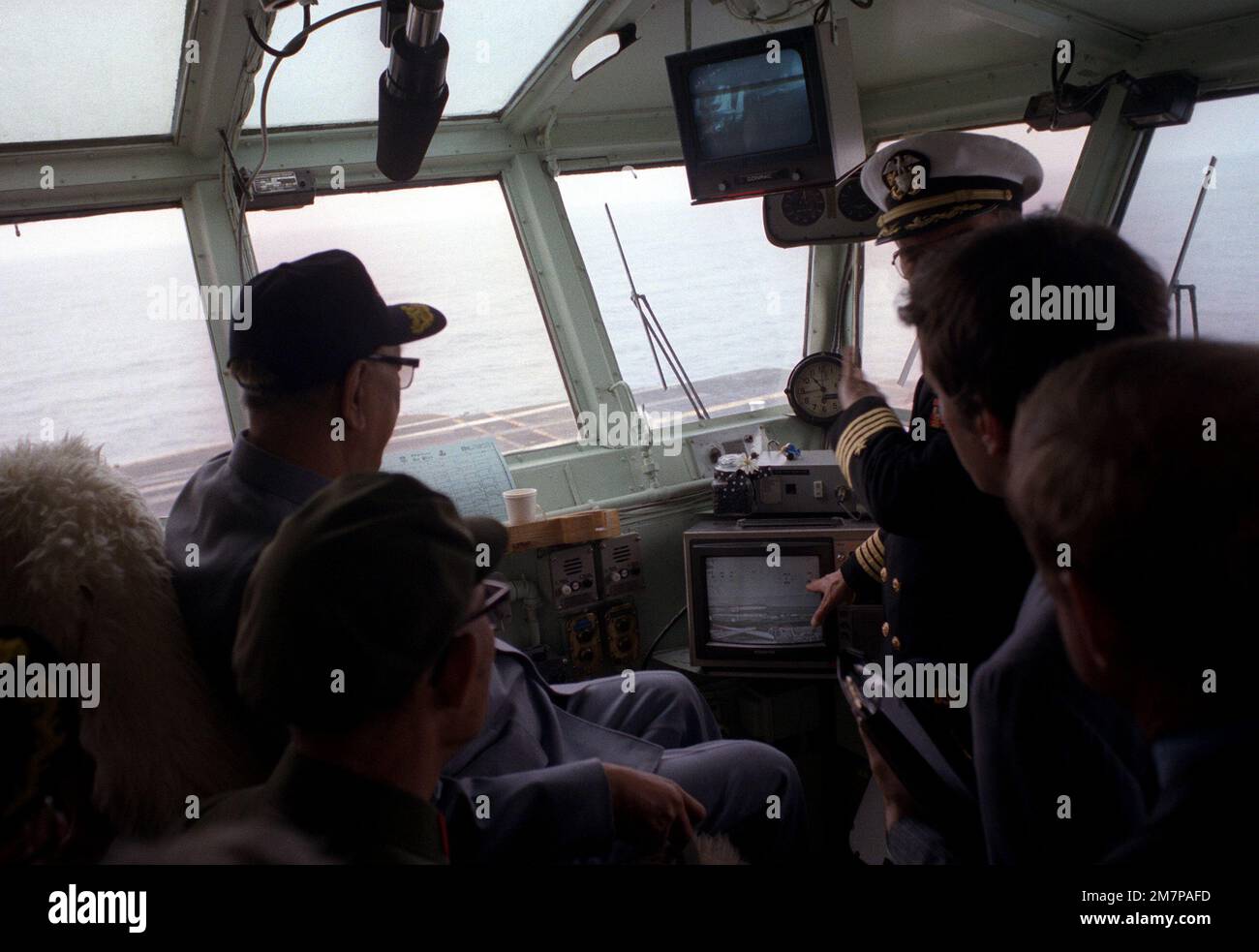Vice Premier Geng Biao, People's Republic of China, sits in the captain ...