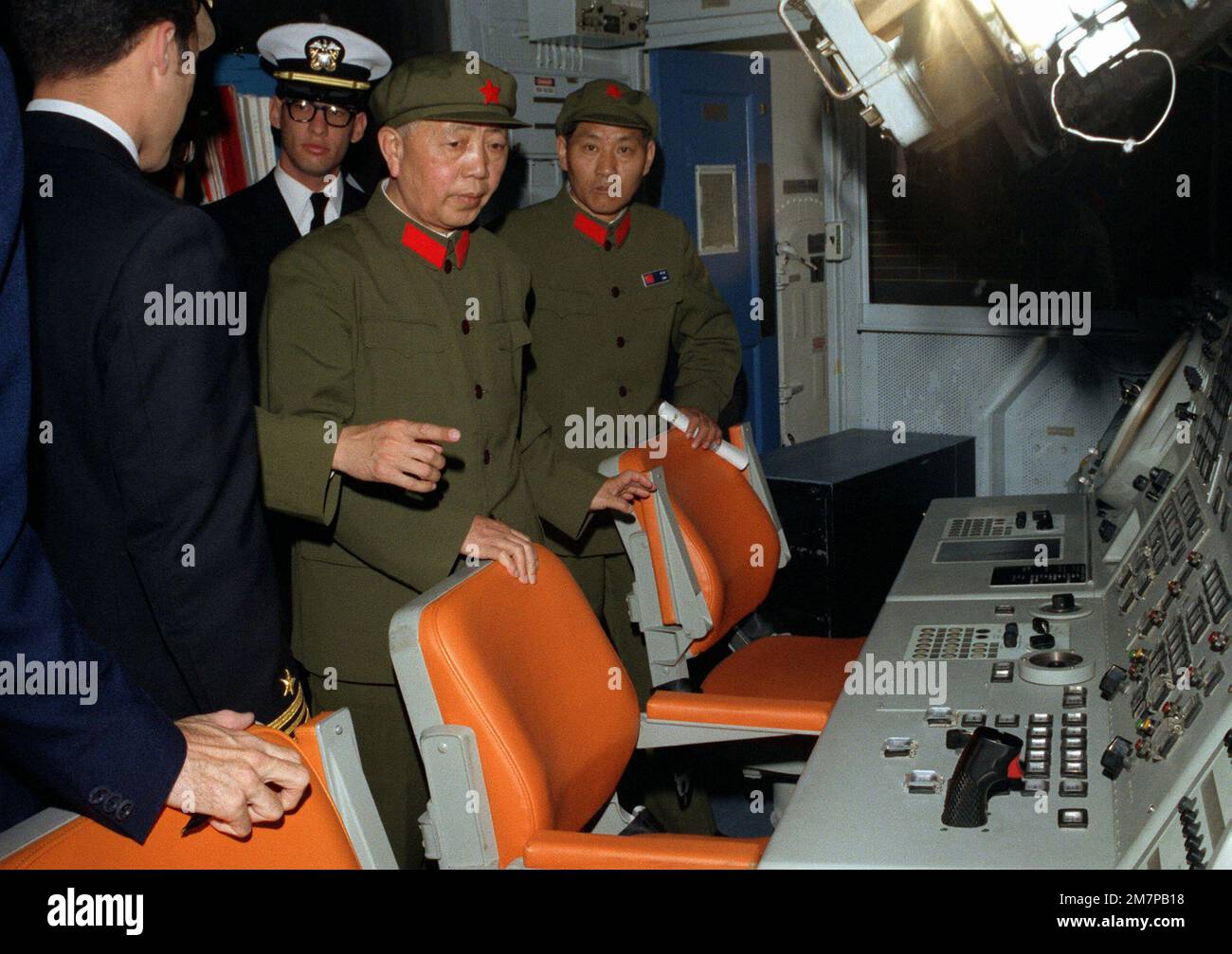 Members of the delegation from China tour the guided missile cruiser ...