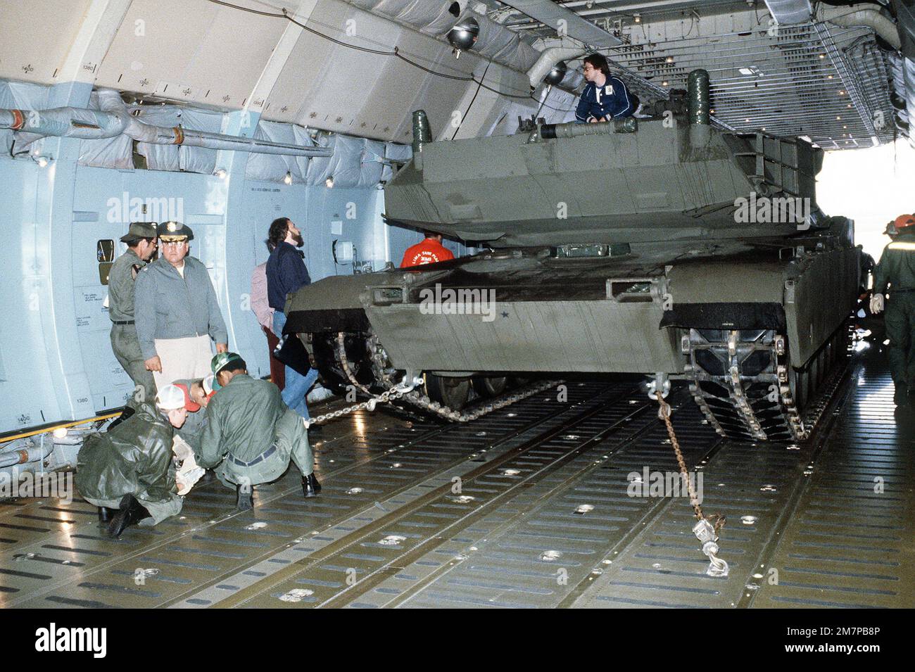 A front view of an XM-1 Abrams tank being secured aboard a C-5A Galaxy ...