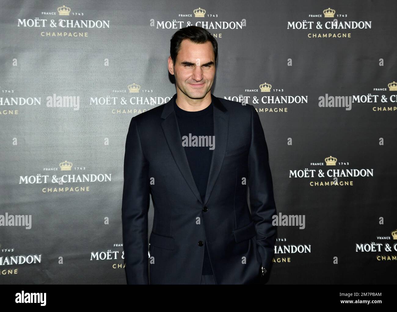 Roger Federer attends the Moet & Chandon holiday season celebration at ...