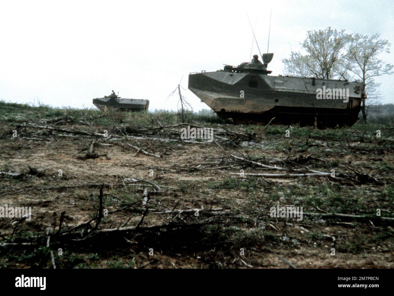 Two LVTP-7 personnel tracked landing vehicles are operated at the ...