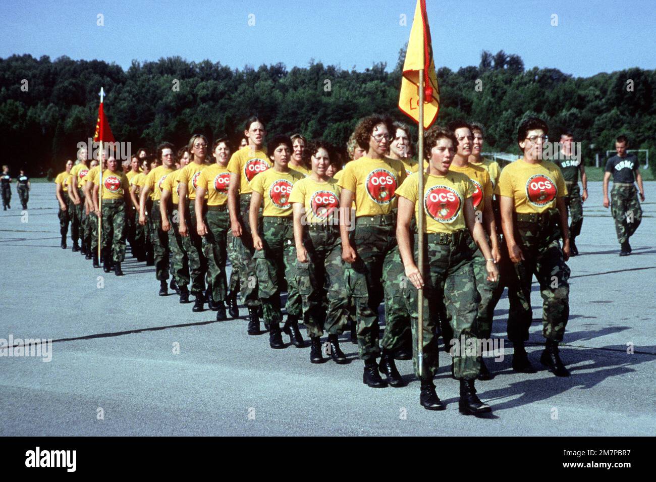 Female Marine officer candidates march in formation while training at ...