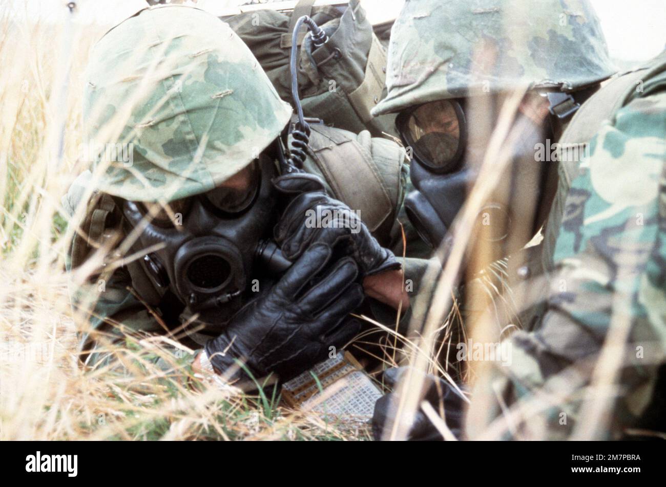 A close view of two combat-ready Marine officer candidates wearing ...
