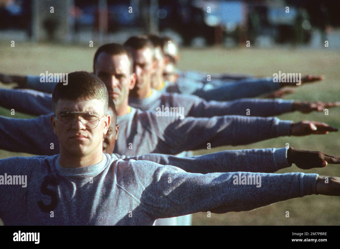 Marine officer candidates perform calisthenics as part of their daily ...