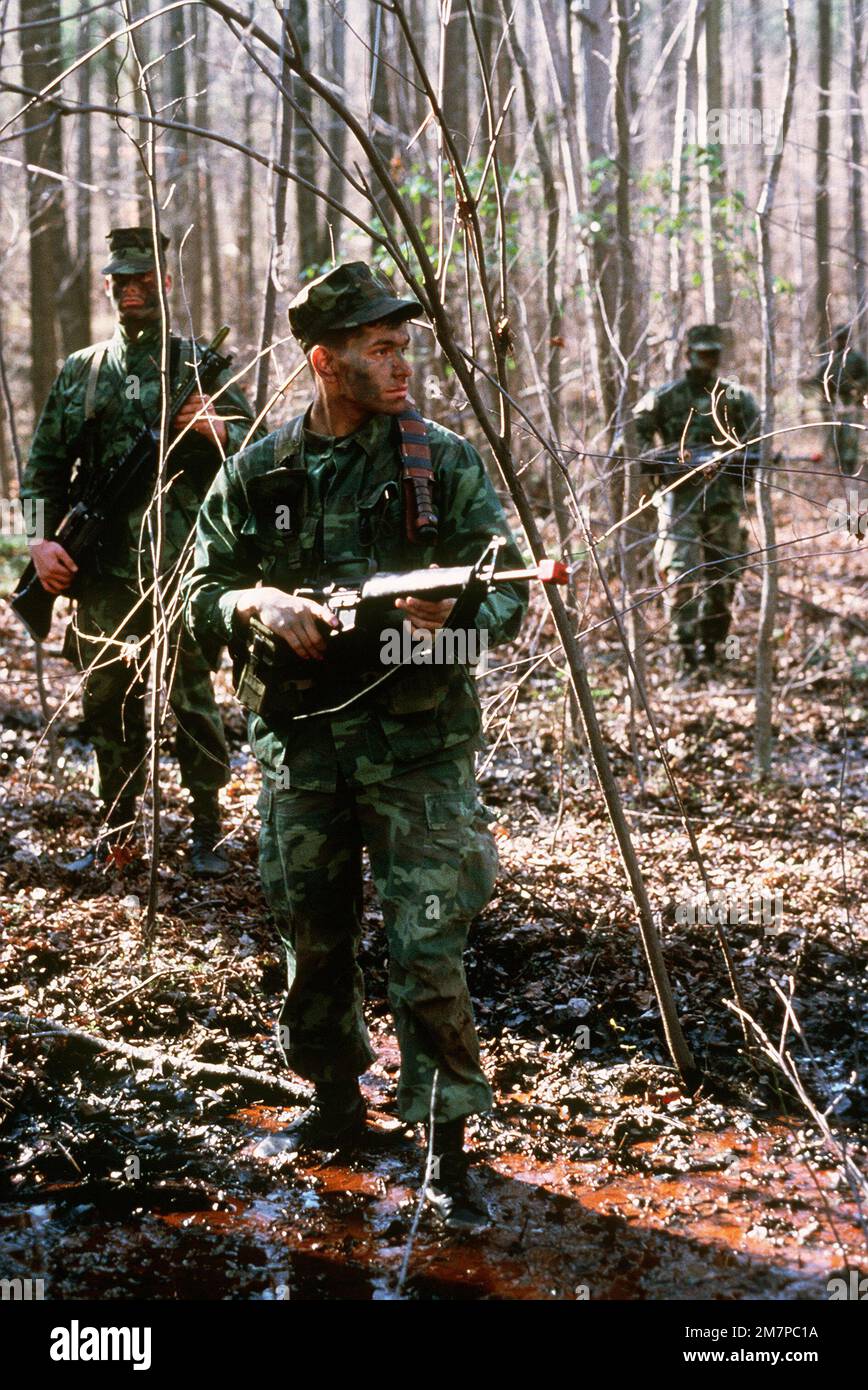 Radioman PFC. J. Krippendorf and his squad leader, CPL. C. Candelario ...