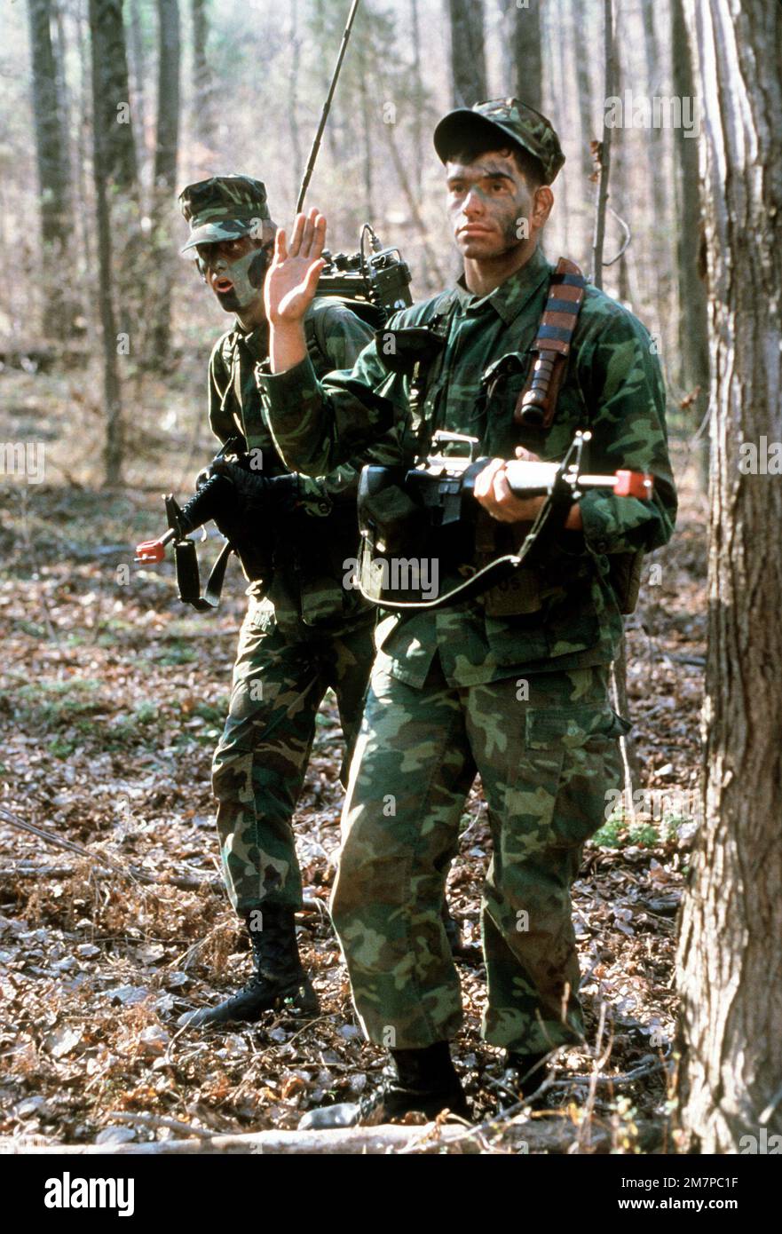 Radioman PFC J. Krippendorf and his squad leader, CPL C. Candelario ...
