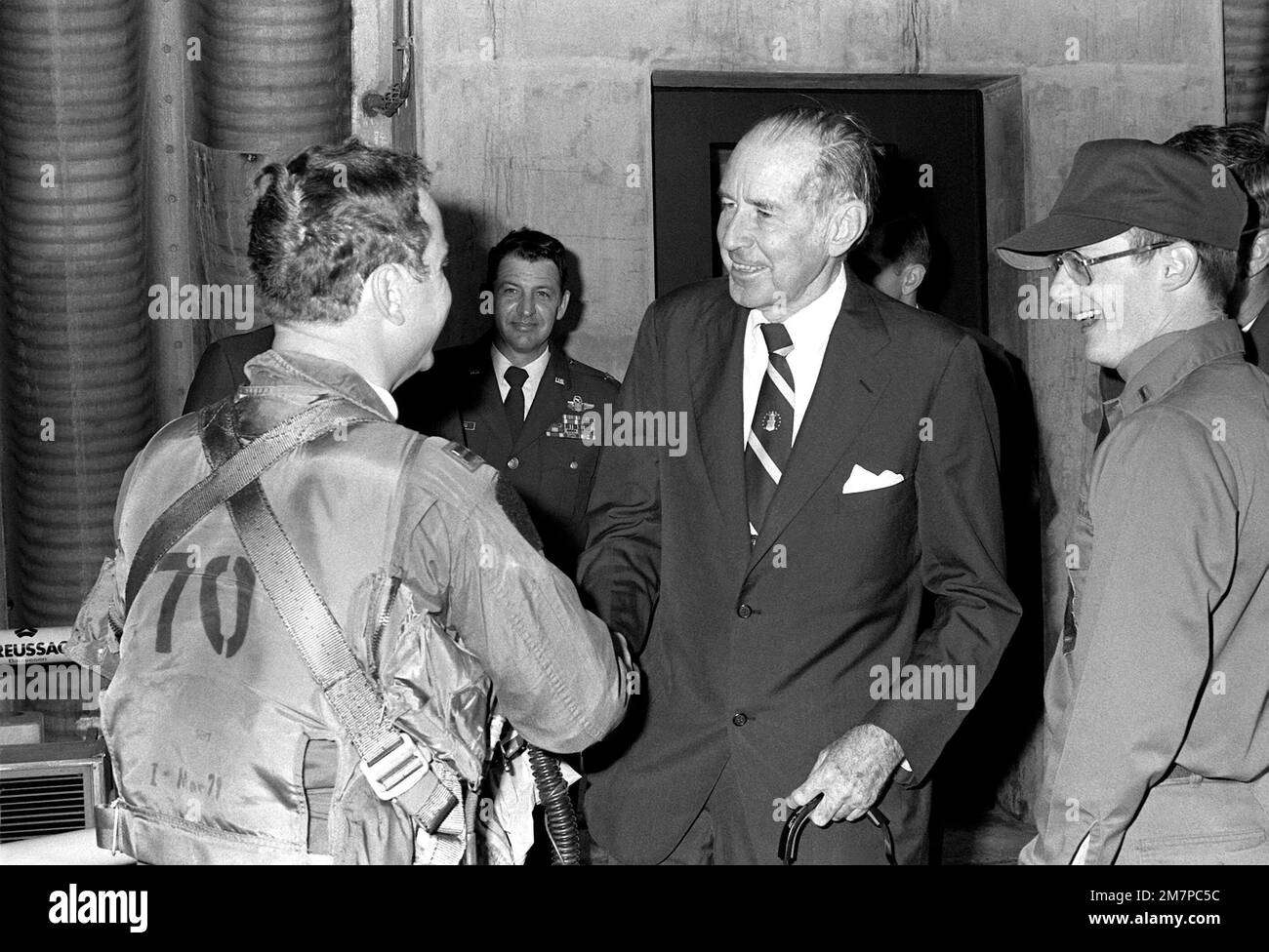 Deputy Secretary of Defense Graham Claytor greets an F-4 Phantom II ...