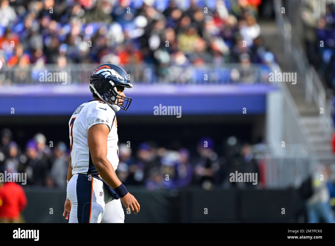 Denver Broncos quarterback Russell Wilson walks onto the field during ...