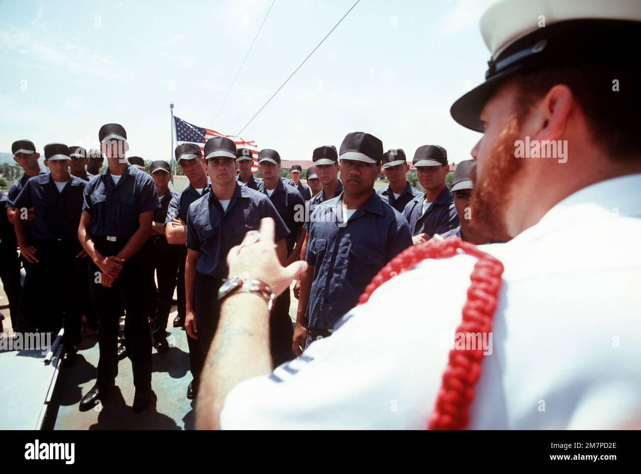 A petty officer instructs recruits aboard the training destroyer escort ...