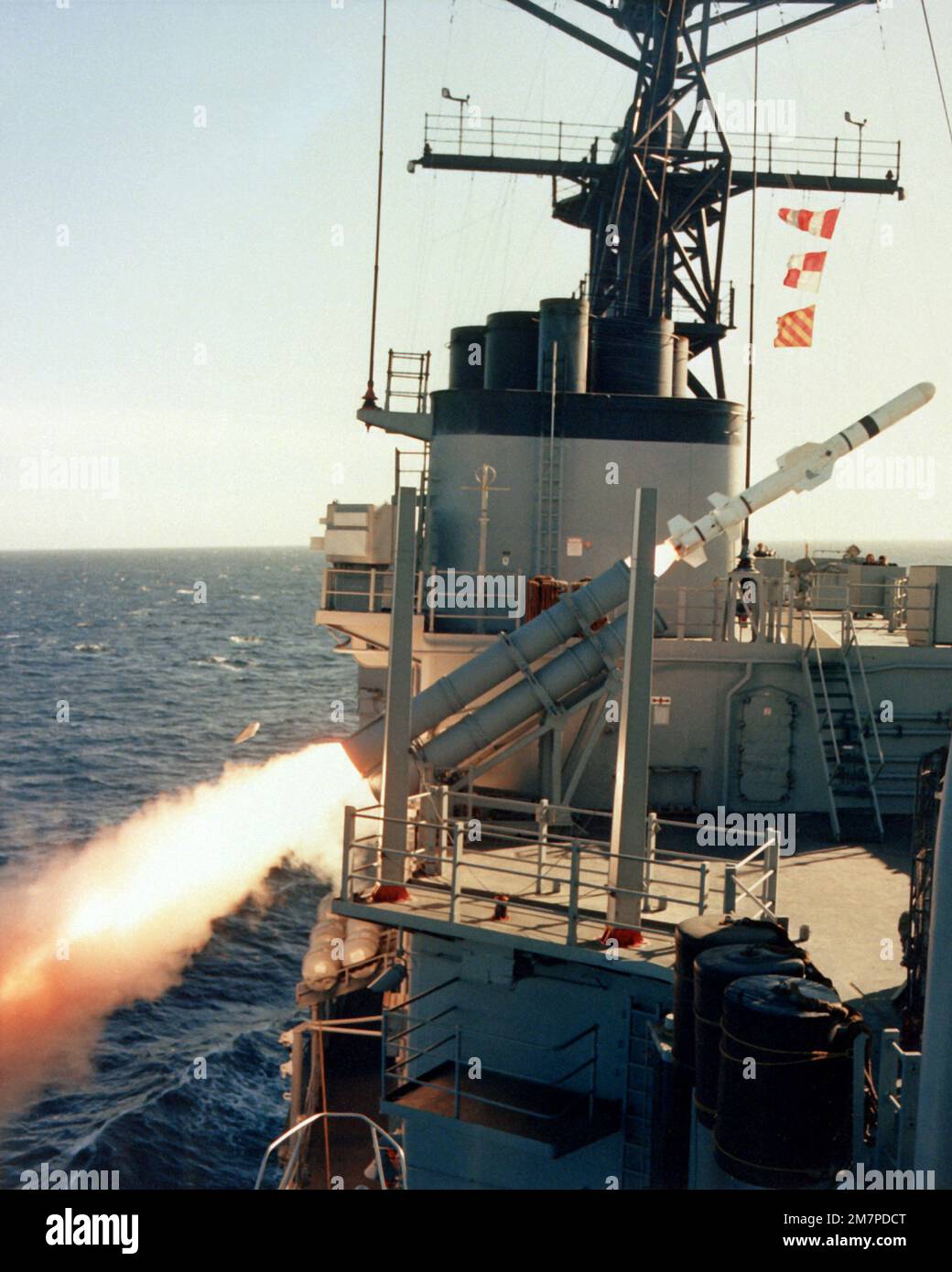 A side view of an RGM-84 Harpoon missile immediately after being fired ...