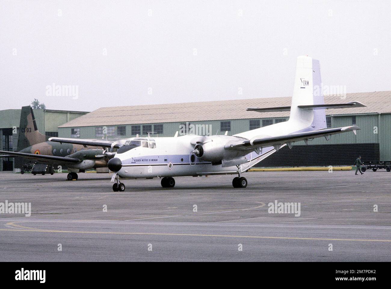 A front view of a C-7 Caribou aircraft taxiing into takeoff position on ...