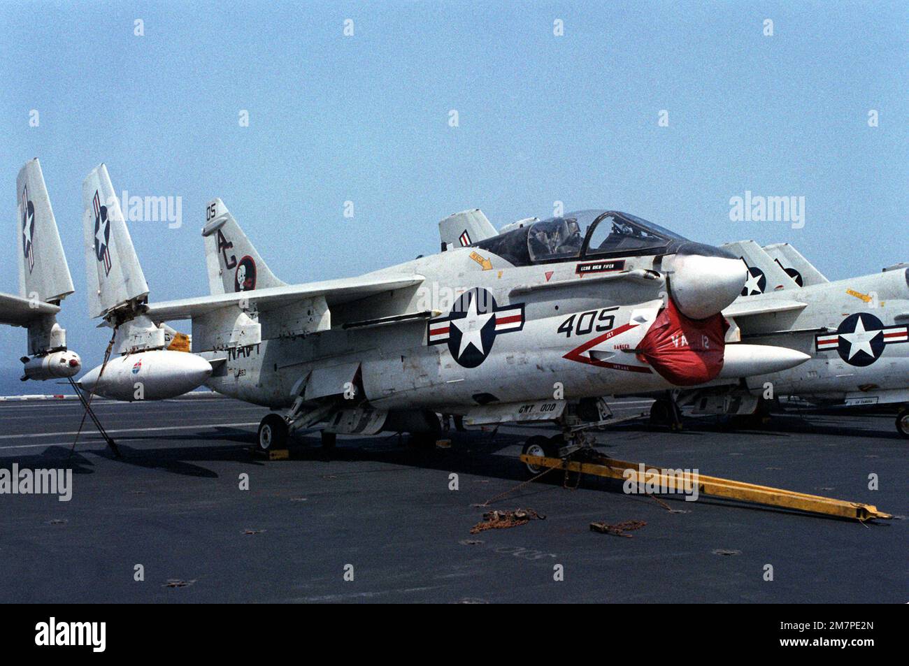 A right front view of an A-7E Corsair II aircraft, with wingtips folded ...