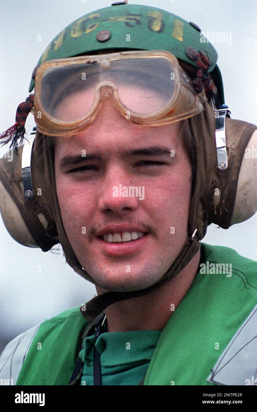A portrait of a flight deck crewman participating in aircraft launching ...