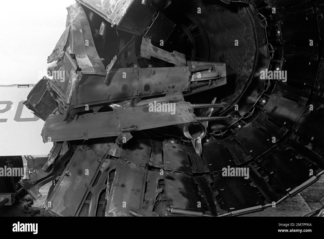 A view of damage caused to the engine exhaust of an F-4 Phantom II ...