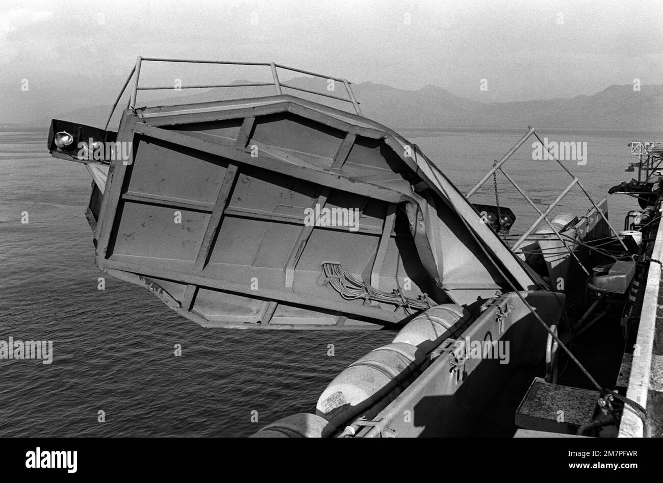 A view of damage caused to the deck edge optical landing system ...