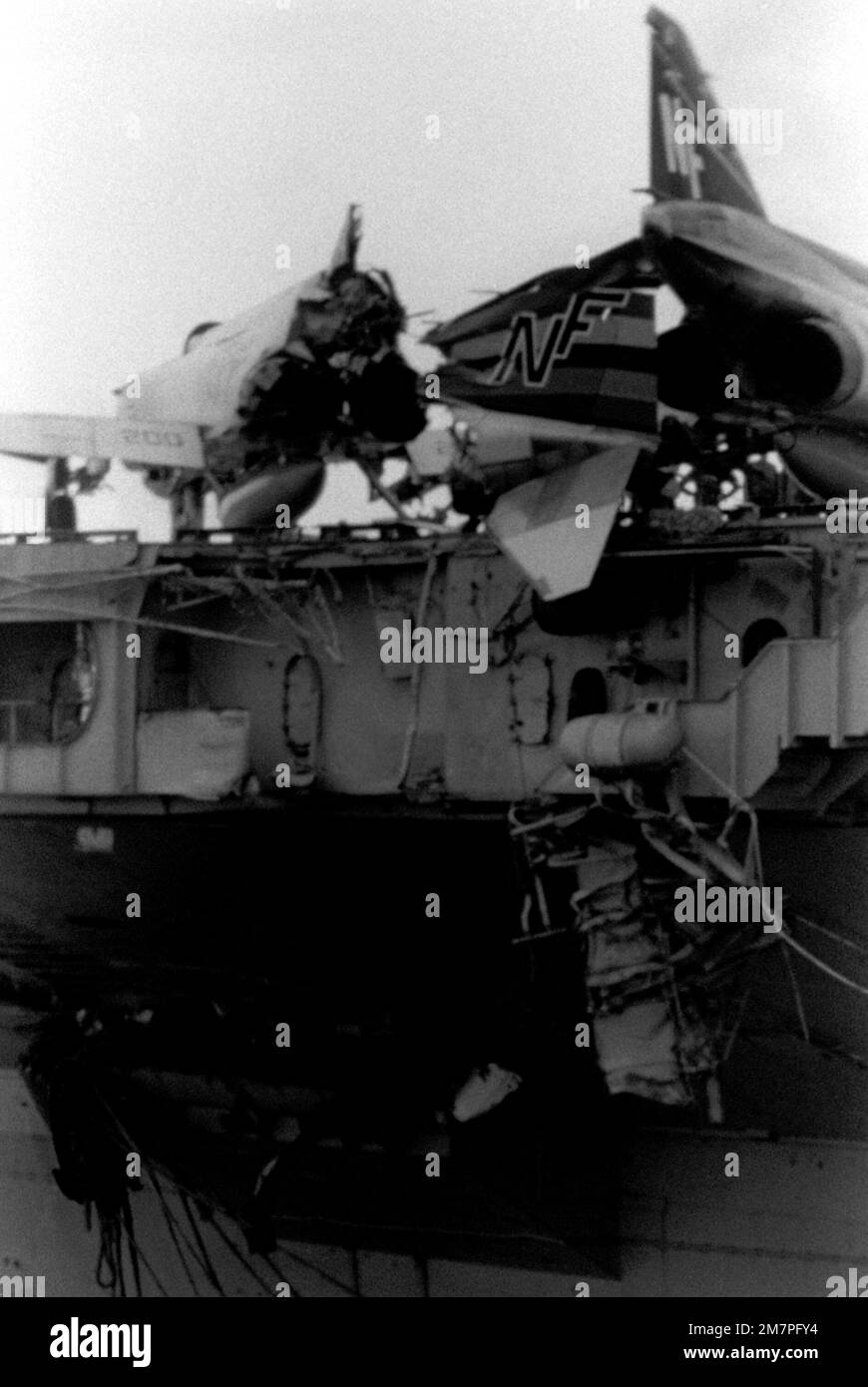 A view of damage caused to the deck edge optical landing system ...