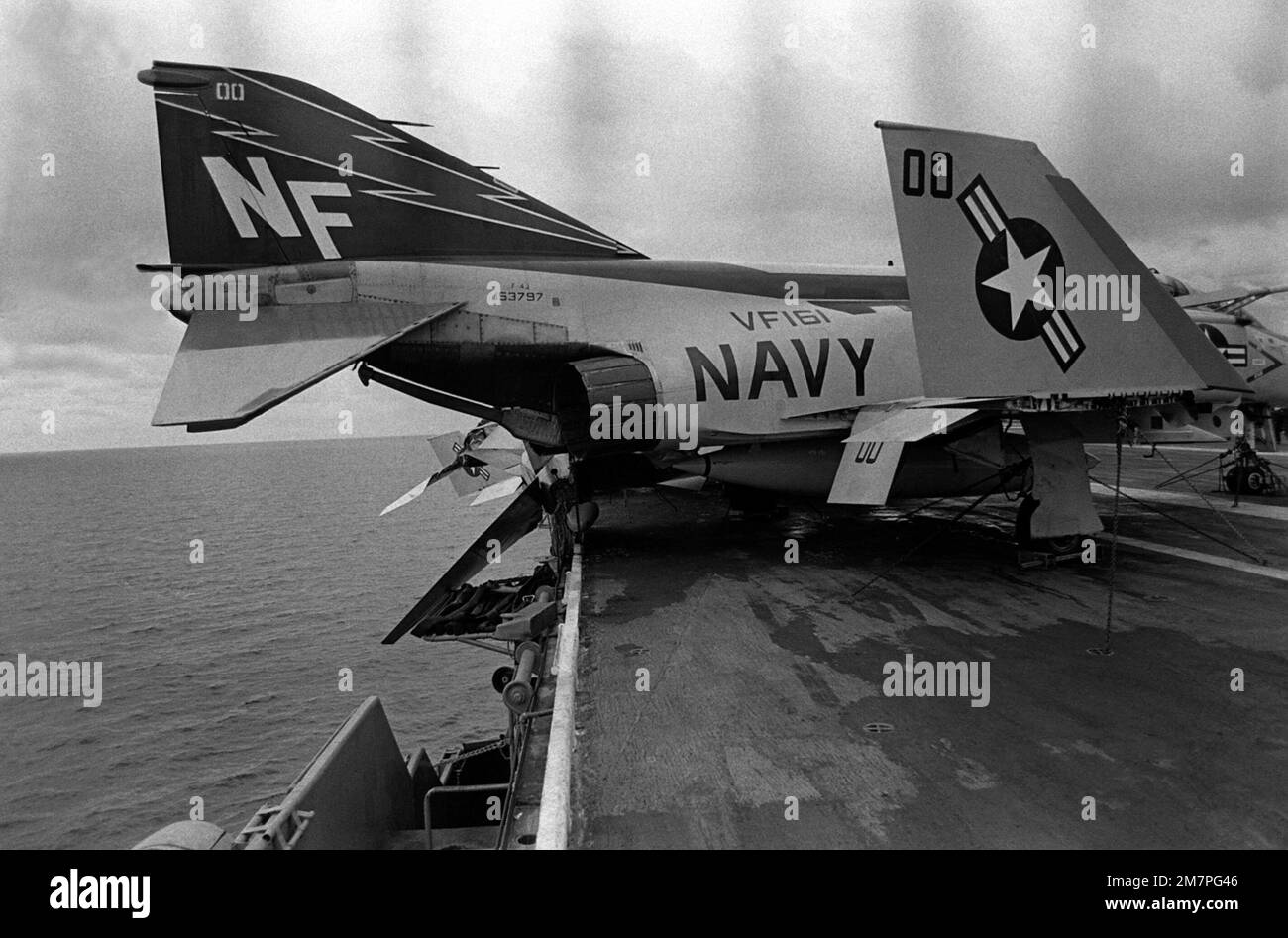 A view of damage caused to several F-4 Phantom II aircraft parked on ...