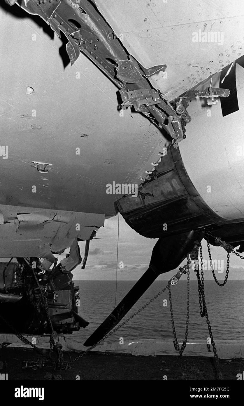 A view of damage caused to an F-4 Phantom II aircraft that was parked ...